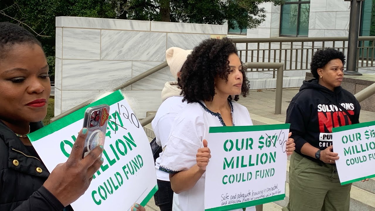 Black Women Drop Banner at Atlanta City Hall Opposing Cop City Complex ...