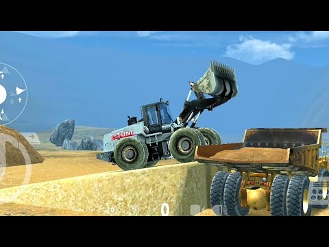 Loader loading the iron ore on haul truck || Heavy machines and mines ...