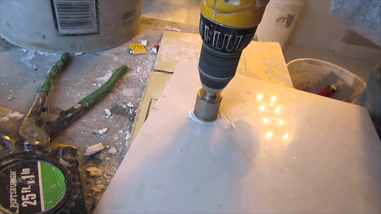 How to make a hole in tile with a core bit - YouTube
