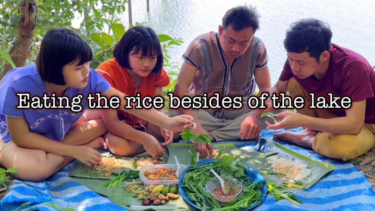Eating the rice besides of the lake. - YouTube