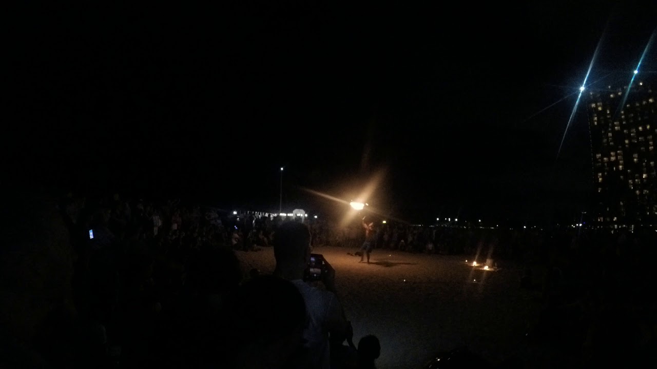 Fire torches on the beach - YouTube