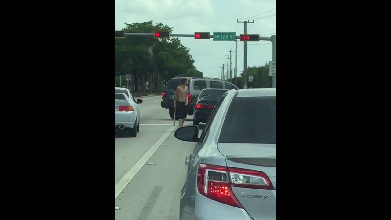 Man uses baseball bat to smash window in road-rage incident - YouTube