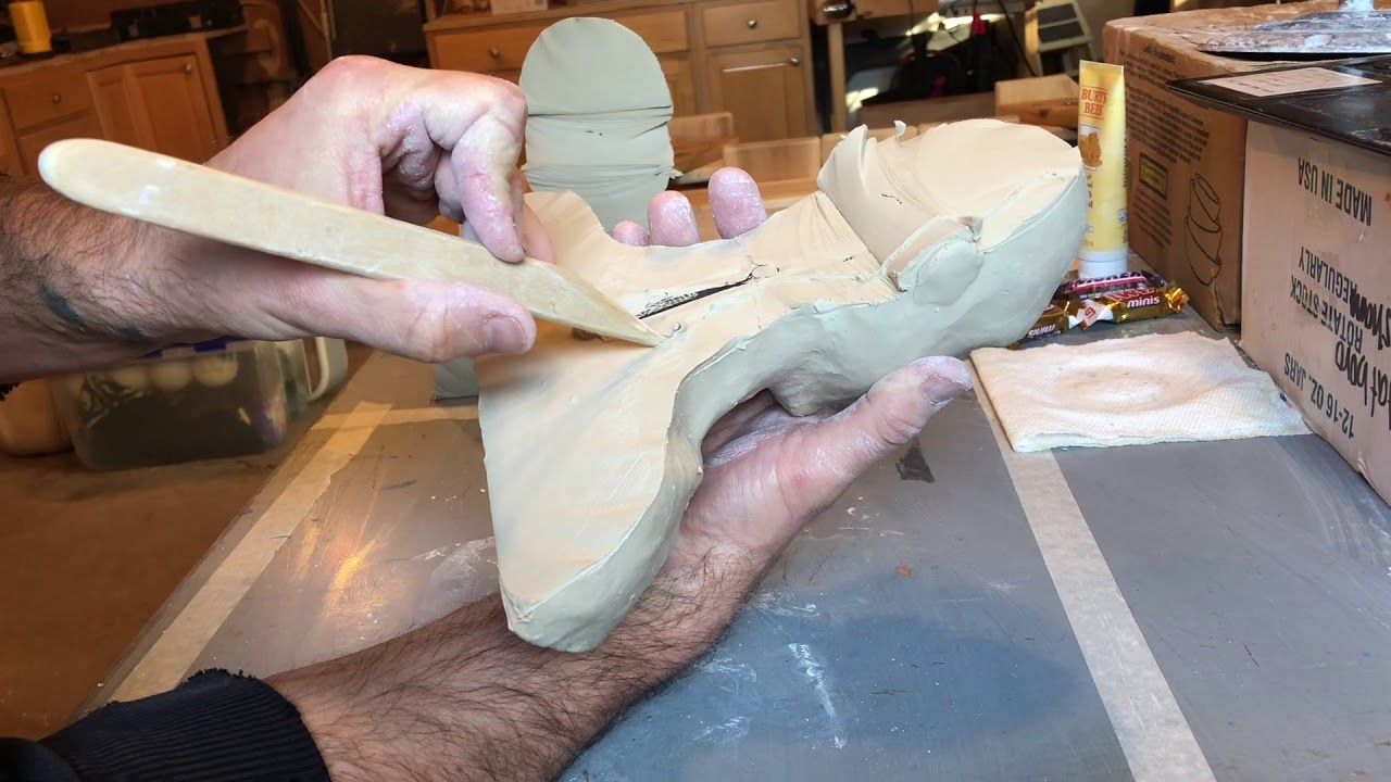 How to hollow out a clay sculpture bust - YouTube
