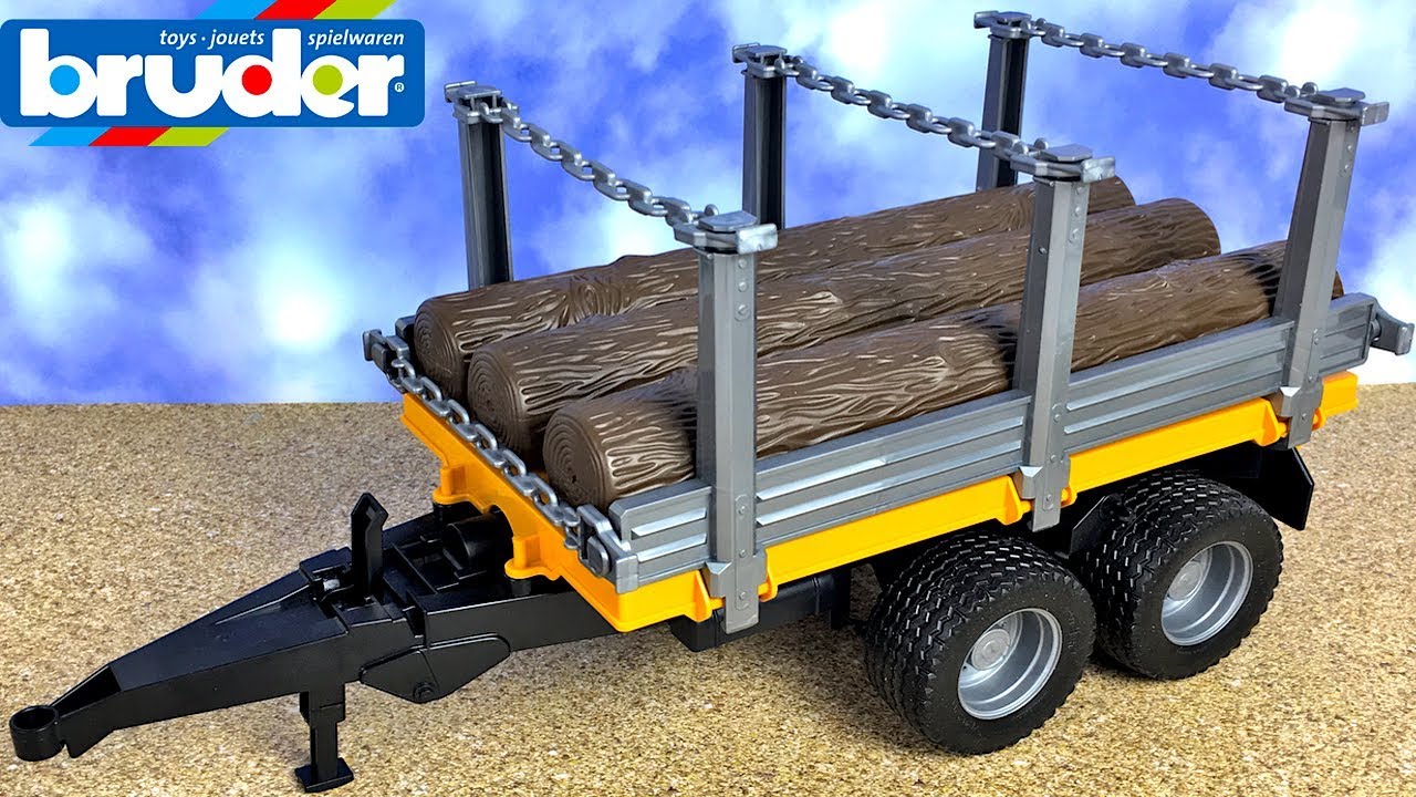 UNBOXING BRUDER LOGGER TRAILER & MIGHTY MACHINES WORKING IN THE FOREST ...