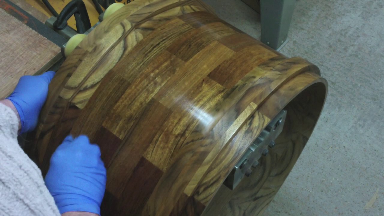 Ovangkol bass drum - 1st shellac application - YouTube