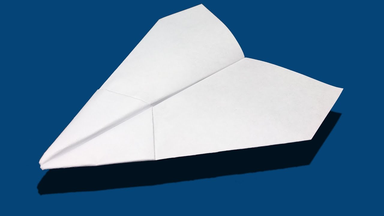 How to make a glider paper airplane that flies far - YouTube