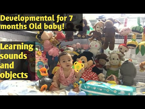 Developmental for 7 months old baby | Holding balls | touching objects ...