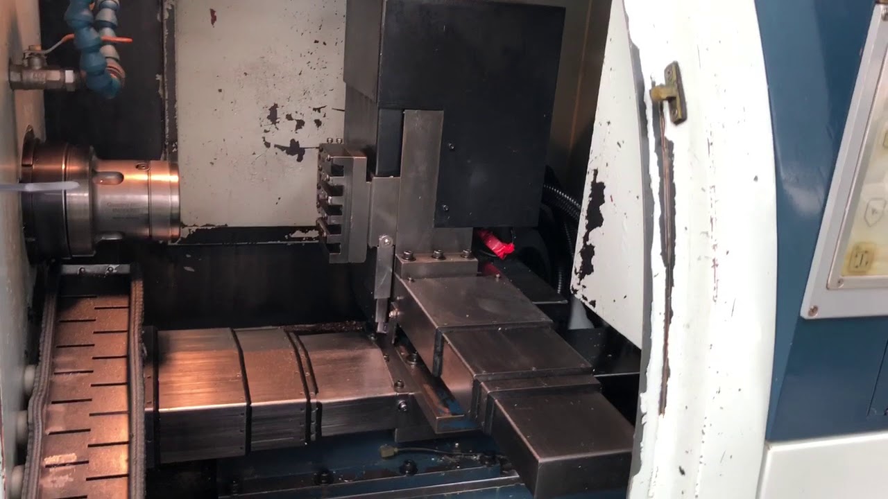 Quick-Tech AT15 CNC lathe hop machines - YouTube