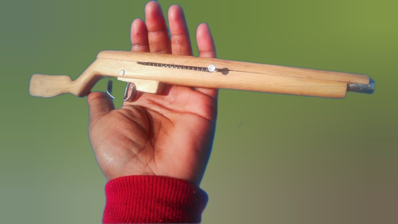 make a wooden spring gun simple wood craft - YouTube