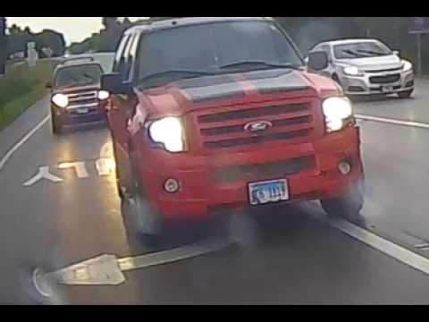 Ford Expedition Holding up left lane traffic on Algonquin Get around him and starts tailgating me!