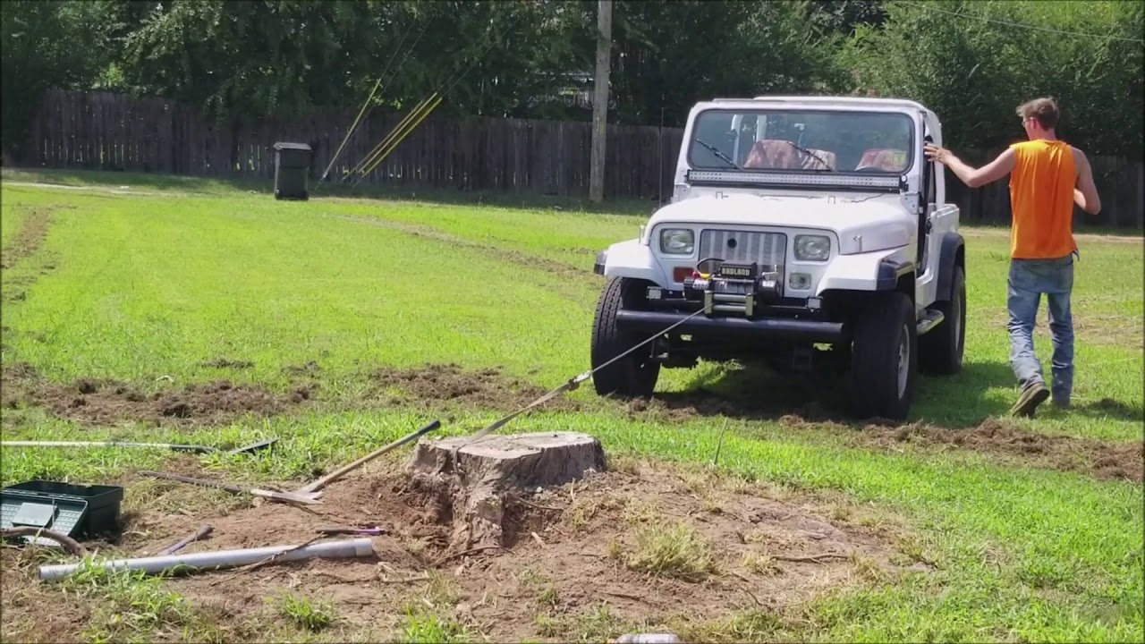 How to take out a tree stump with a Jeep - YouTube