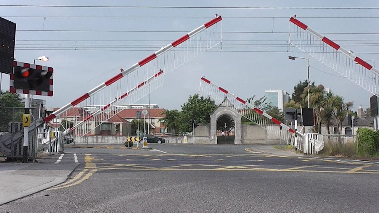 Merrion Gates Level Crossing - 8300 Class Dart Train - YouTube