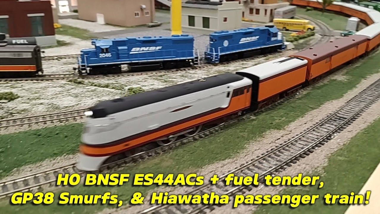 HO Scale BNSF ES44ACs + fuel tender, GP38 Smurfs, & Hiawatha passenger train! - YouTube