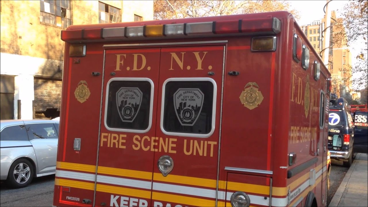 FDNY FIRE SCENE UNIT INVESTIGATING AREA OF 2 ALARM FIRE IN A PARKING ...