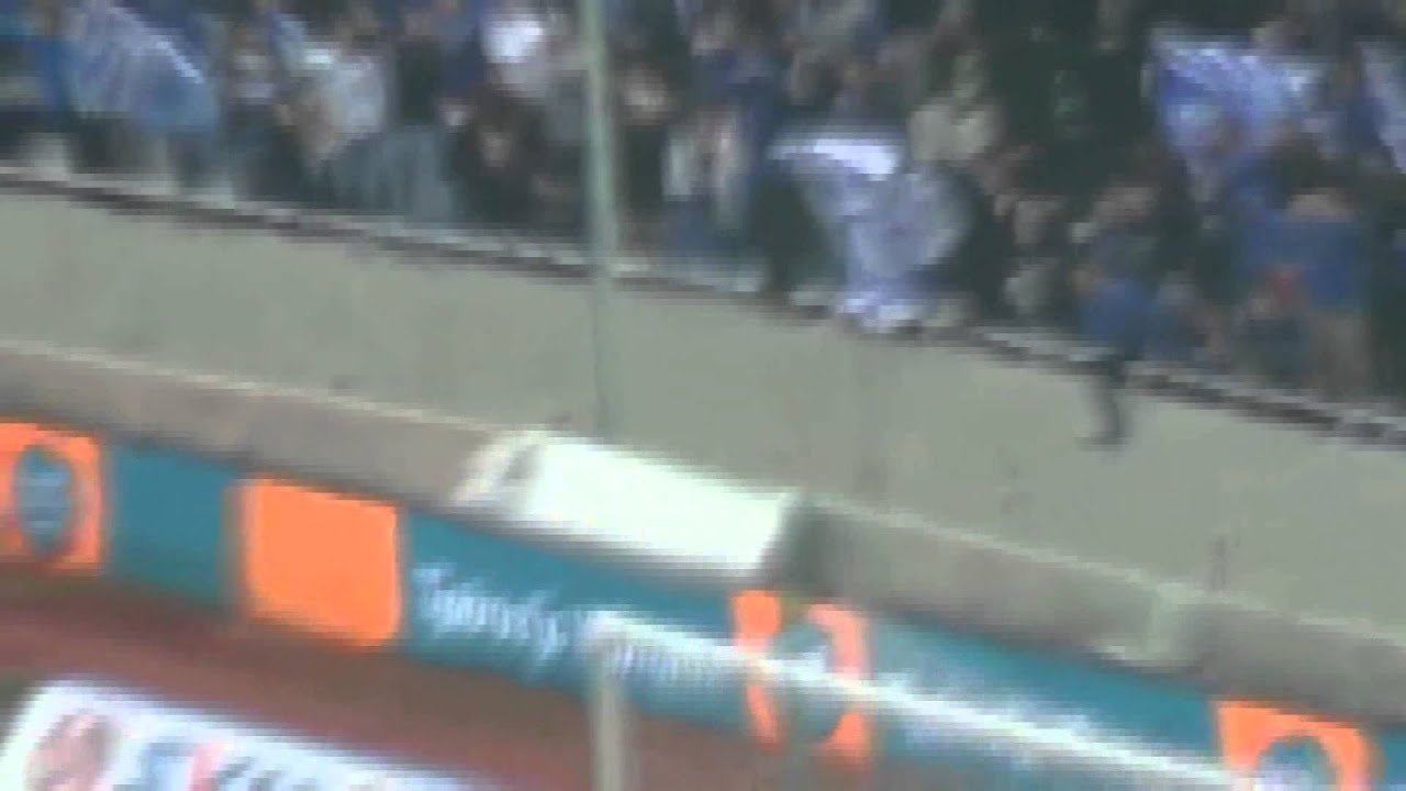 football players singing along with fans! - YouTube