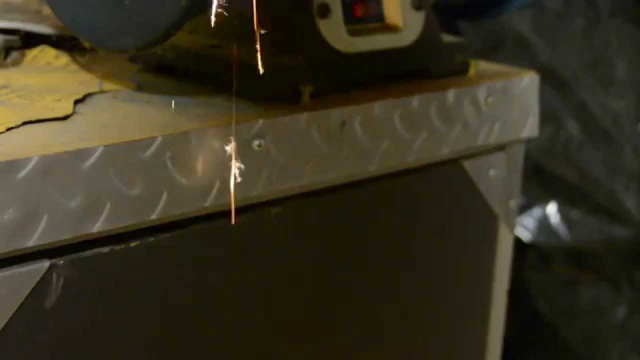 Spark testing smelted steel - YouTube