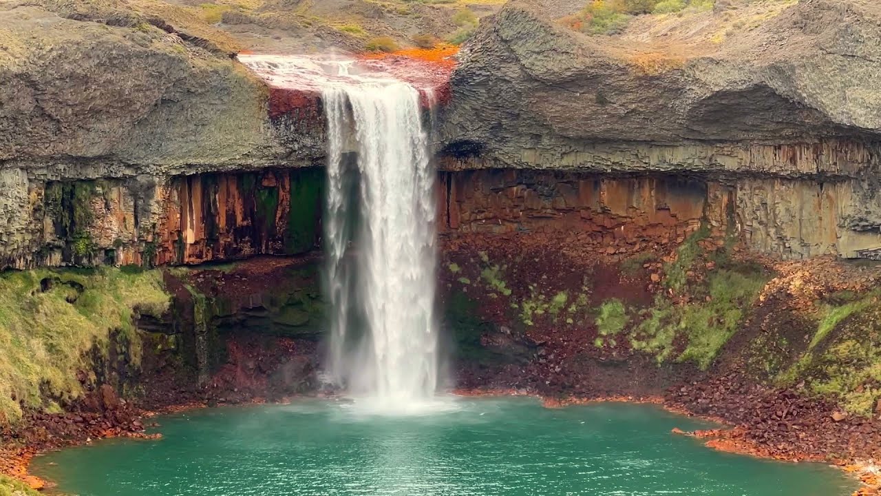 Orange Waterfall, Cave exploring and a Broken Bike // World tour - WEEK ...