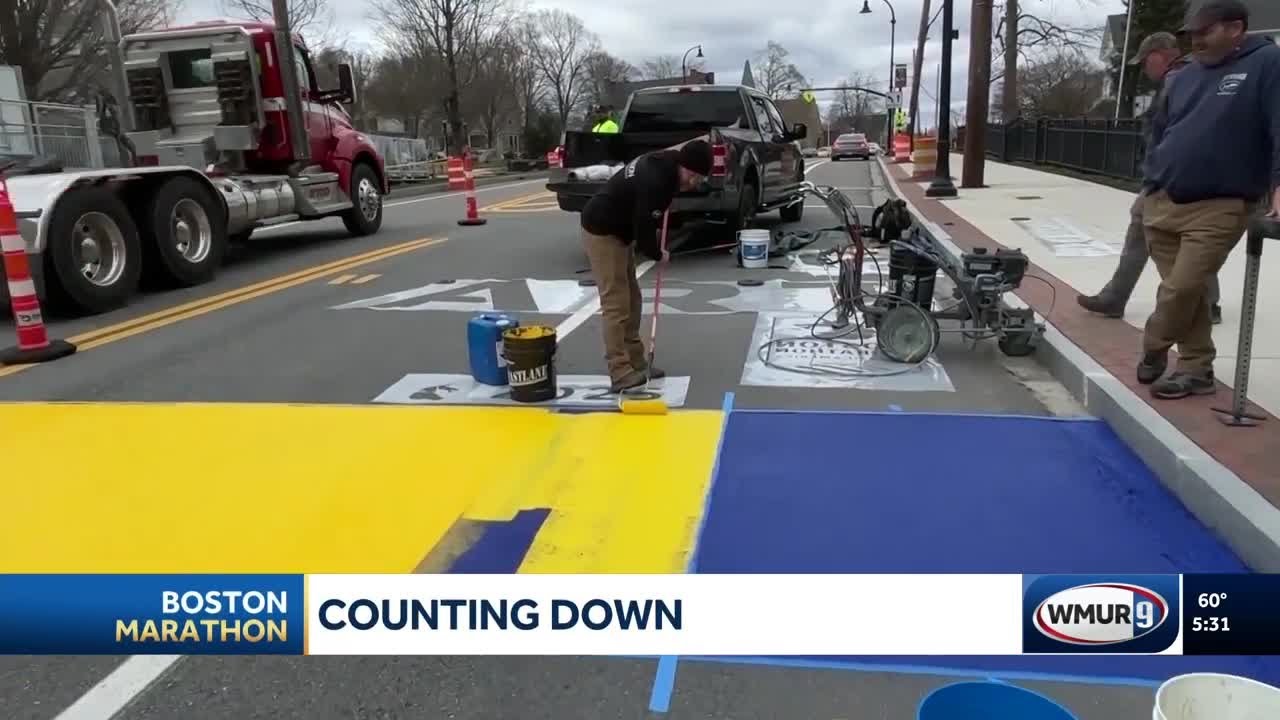Workers put down finish line for Boston Marathon - YouTube