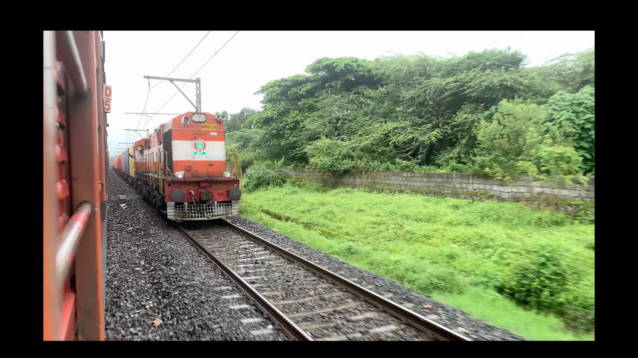 PRAGATI EXPRESS CROSSES CONCOR RAKES LED BY WDG3A.... - YouTube