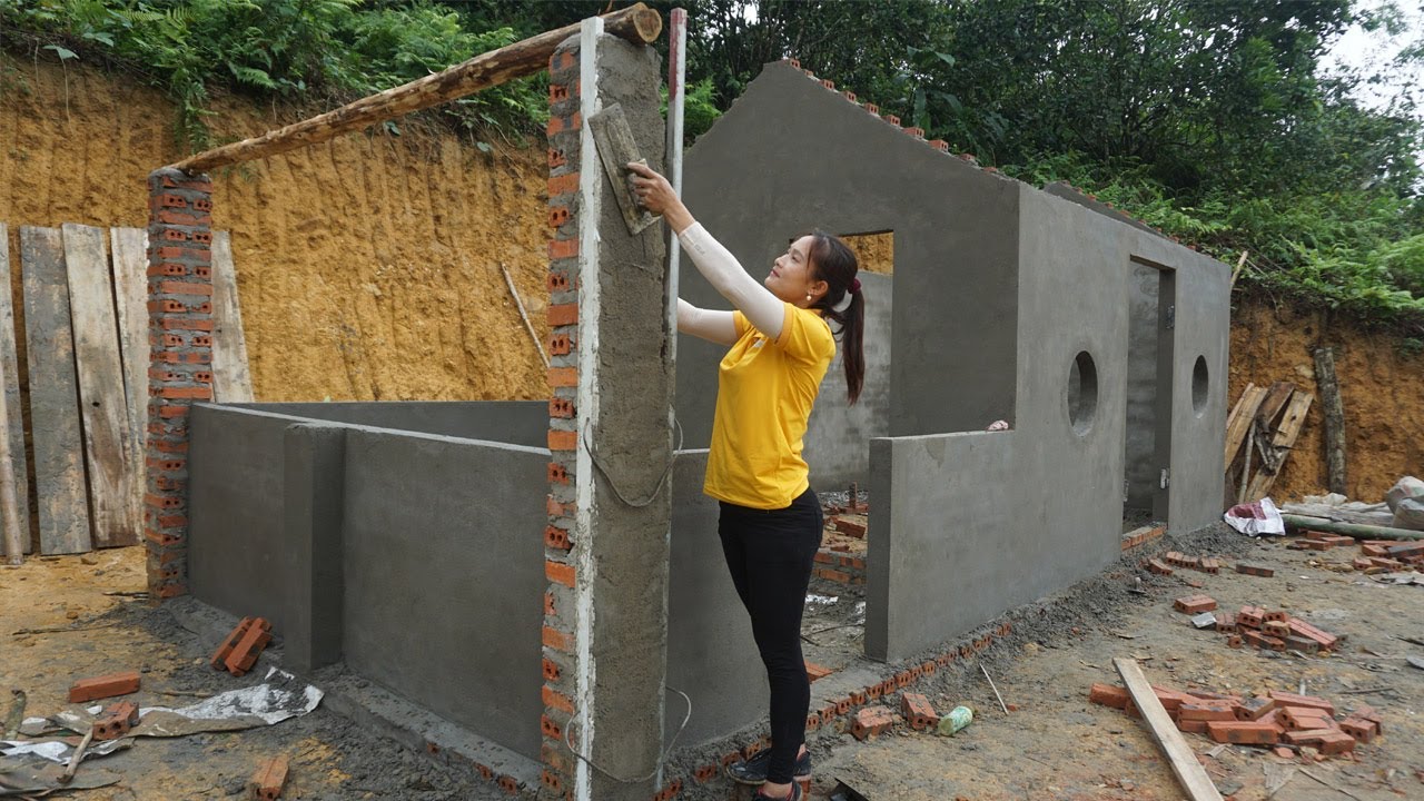 Lonely 20 year old girl: Building bricks house - Finish cement coat to ...