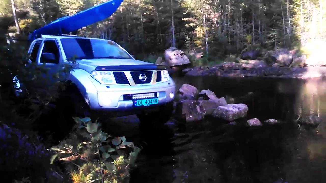 Nissan navara 37" Fjallasport river crossing. - YouTube