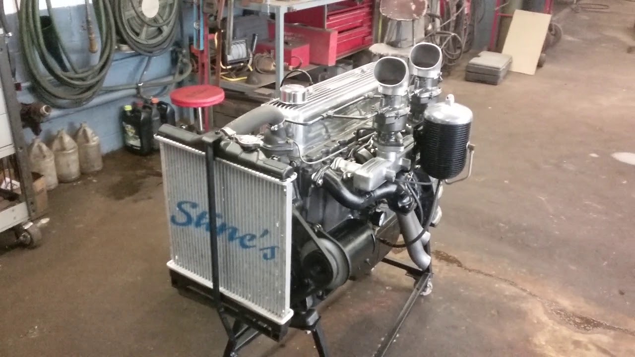Hopped up chevy 216 engine open headers - YouTube