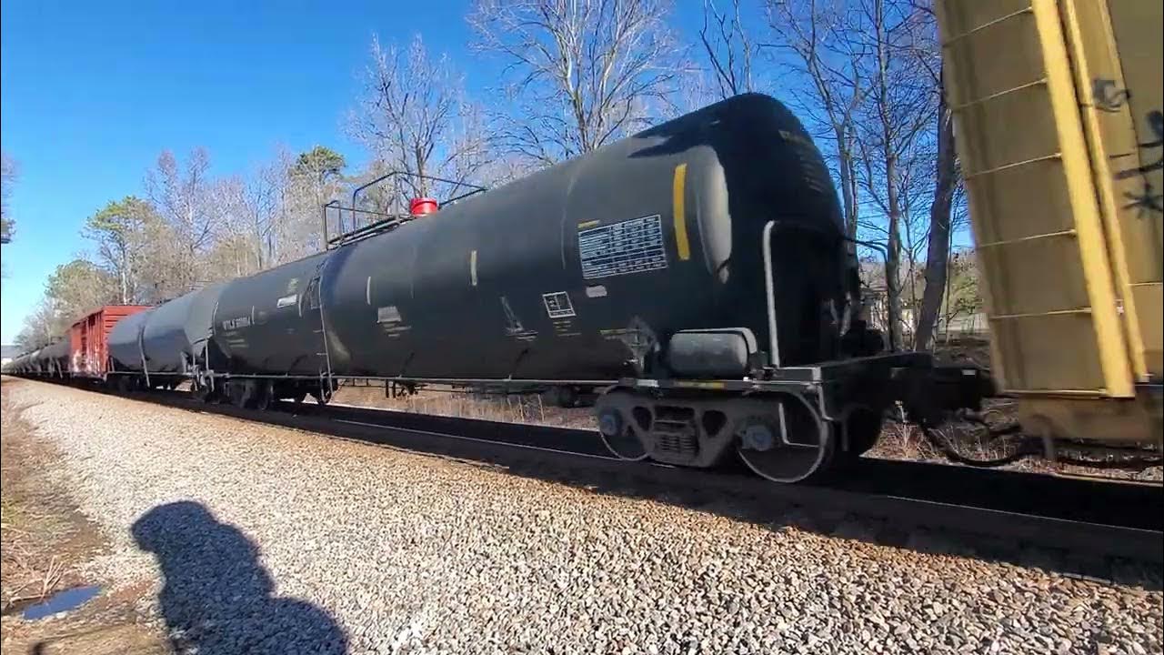 UP 7916 rockets up the grade with a short mixed freight...rear NS DPU - YouTube