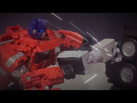 Optimus prime knocking out motor master with 1 punch transformers stop ...