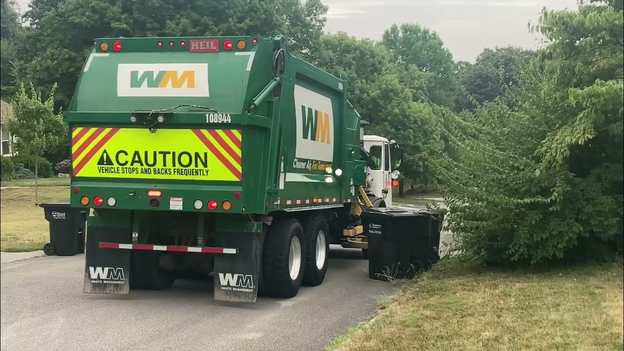 Waste Management python on trash - YouTube