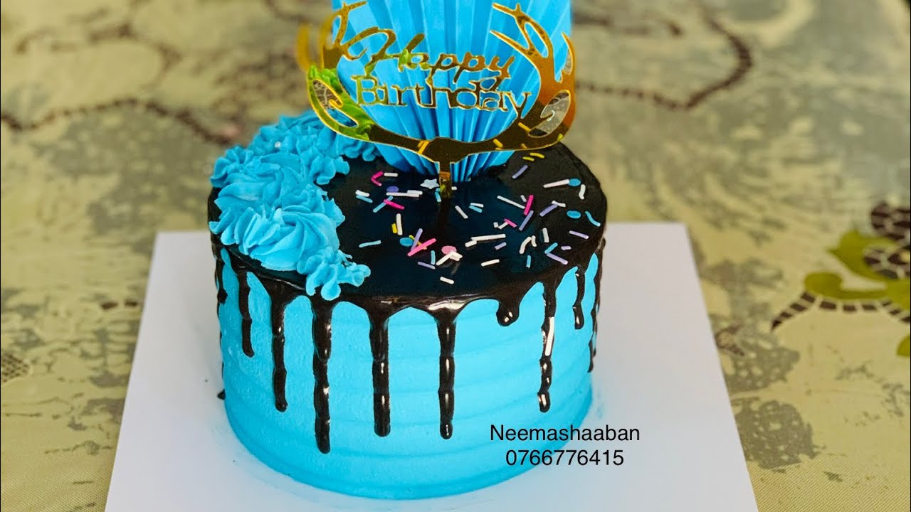 Jinsi ya kupaka coat ya pili kwenye cake #msukuma #neemashaaban - YouTube