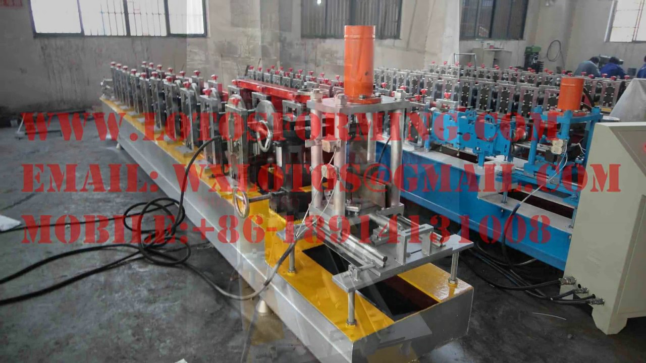 metal roller shutter door guide rails roll forming machine - YouTube