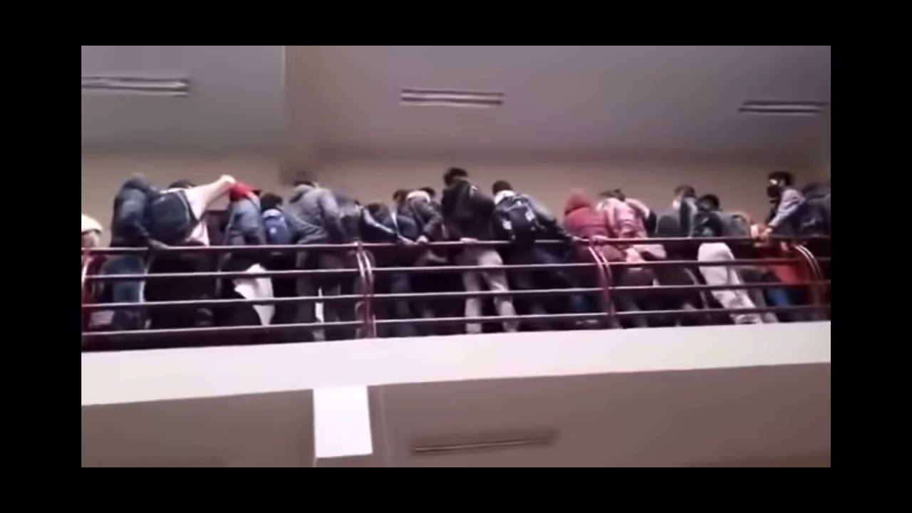 Railing collapses at University. - YouTube