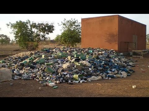 Women in South Africa recycle bottles to make gift boxes and fancy holders [no comment]