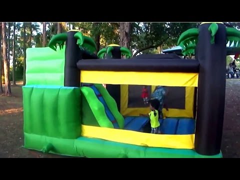 Toddler bounce house jumping fun. Fresh coconut water. Fun at the park ...