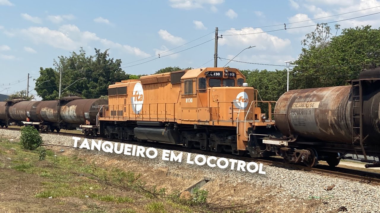 Trem tanqueiro em formação locotrol com as locomotivas SD40BB em Carmo ...