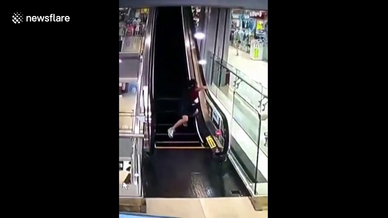 Woman uses escalator as budget treadmill - YouTube