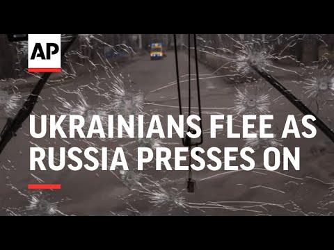 AP PHOTOS: Ukrainians flee as Russia presses on