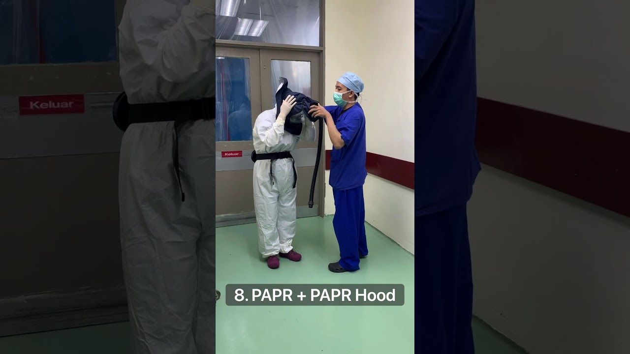 004 Donning of Tyvek Suit with PAPR (surgical team) - YouTube
