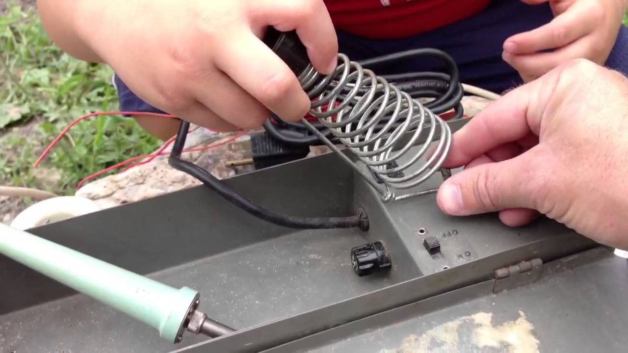 Daniels first time soldering, time to fix the dog fence. - YouTube