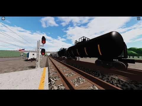 CP 9364 leads a short manifest long hood forward in new CPKC paint scheme over the diamond pt1 ...