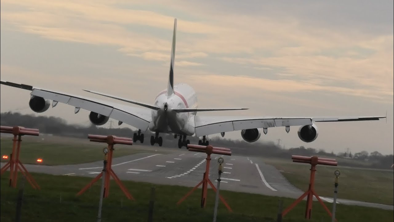 AIRBUS A380 The World’s Largest Passenger Jet ! Windy landing & Takeoff ...