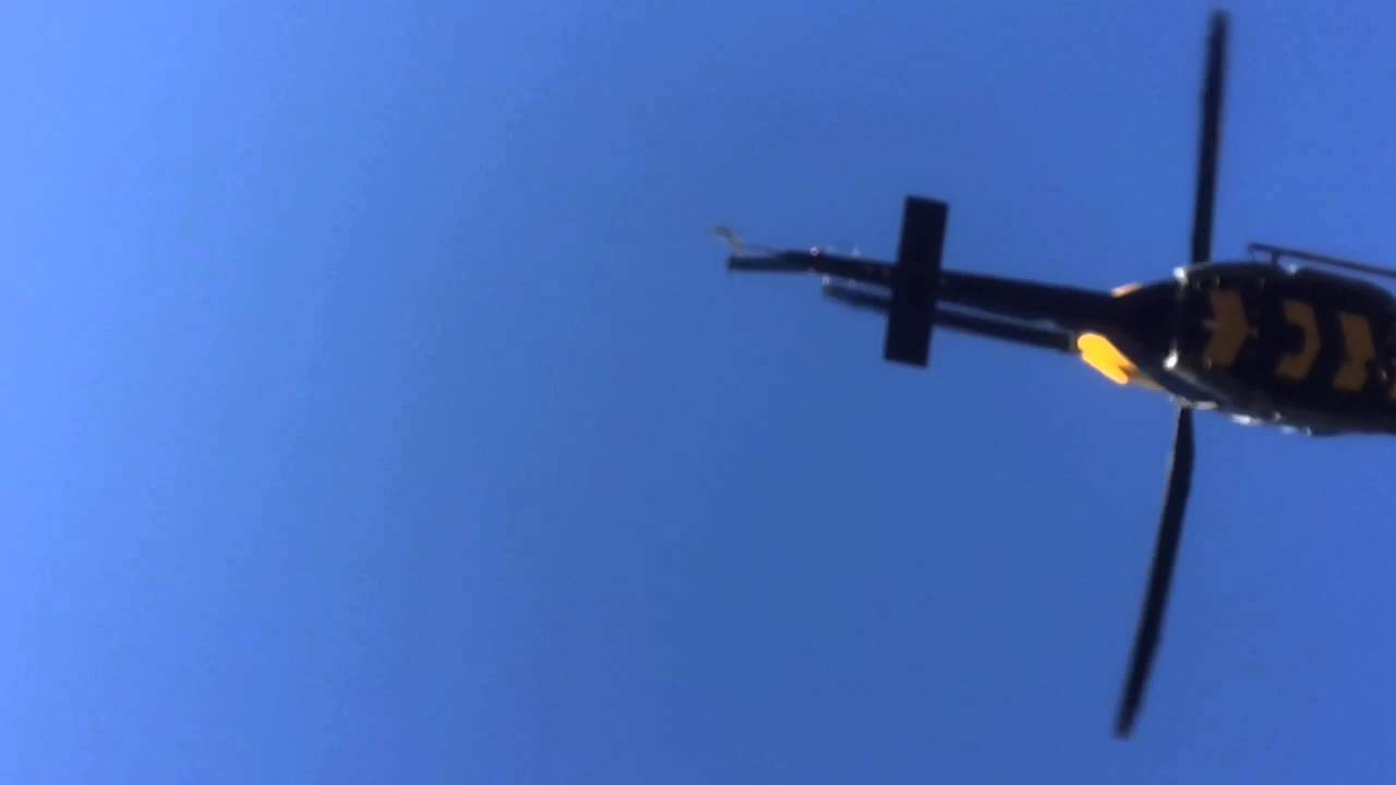 Slow motion helicopter fly-over - YouTube