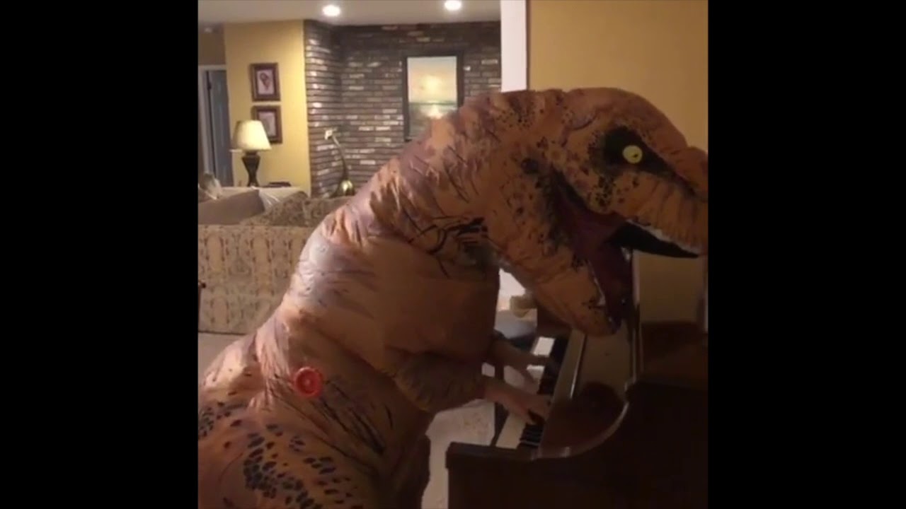 Kid T-Rex plays the piano - YouTube