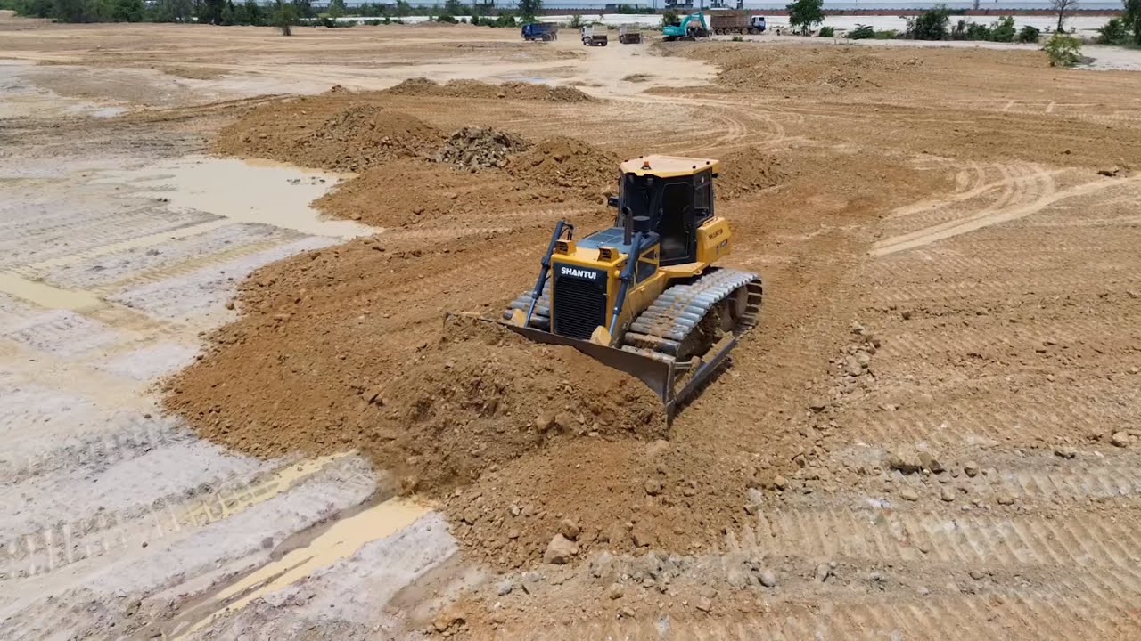 Bulldozer & Trucks at landfill project I action - YouTube