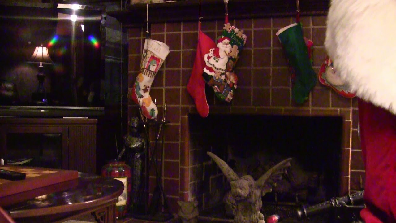 We caught Santa last night filling our stockings - YouTube