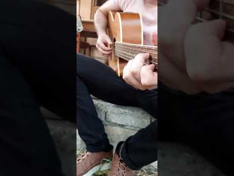 Gitarda gozel ifa.