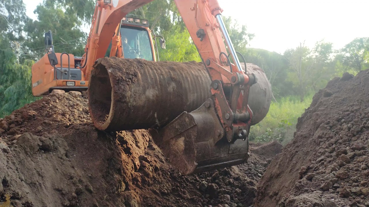 Dx 140 Excavator || Machine Making Water Pipe Line By Pakistani Driver ...