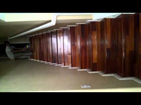 Worlds biggest slinky thrown down the stairs - YouTube