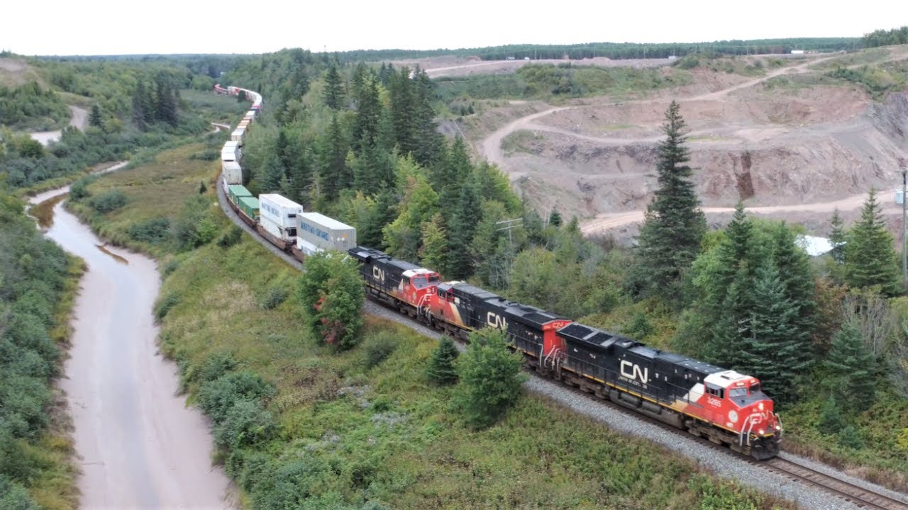 Awesome View in 4K! Very Long Stack Train CN 120 Passing Rock Quarry ...