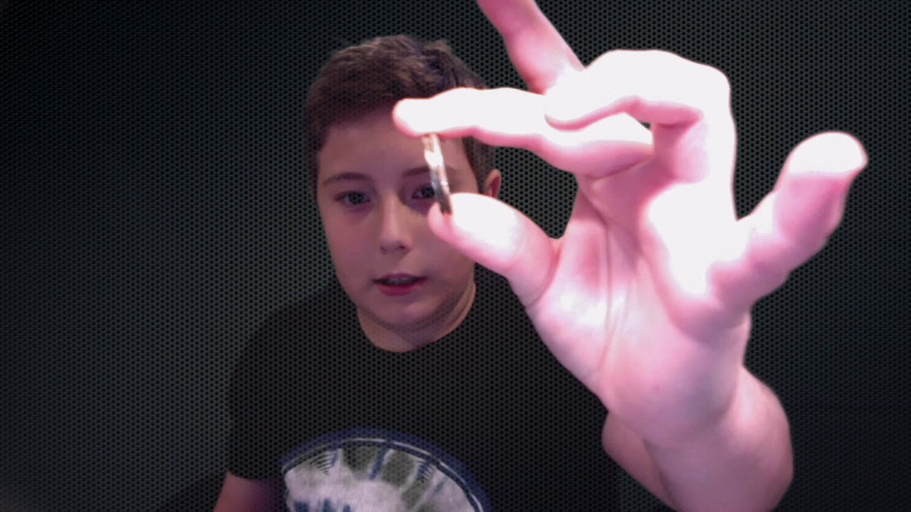 Bite-Out Coin Trick - YouTube